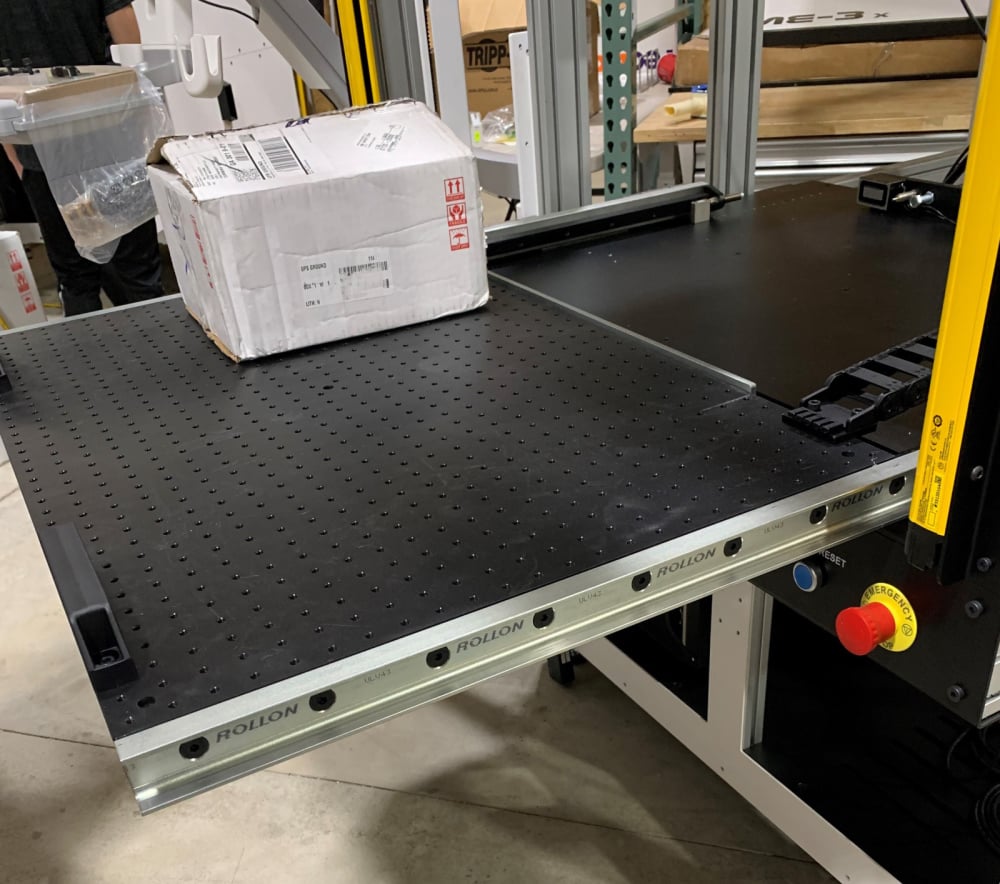 Compact Rail Accurately Positions Dental Molds for Laser Marking